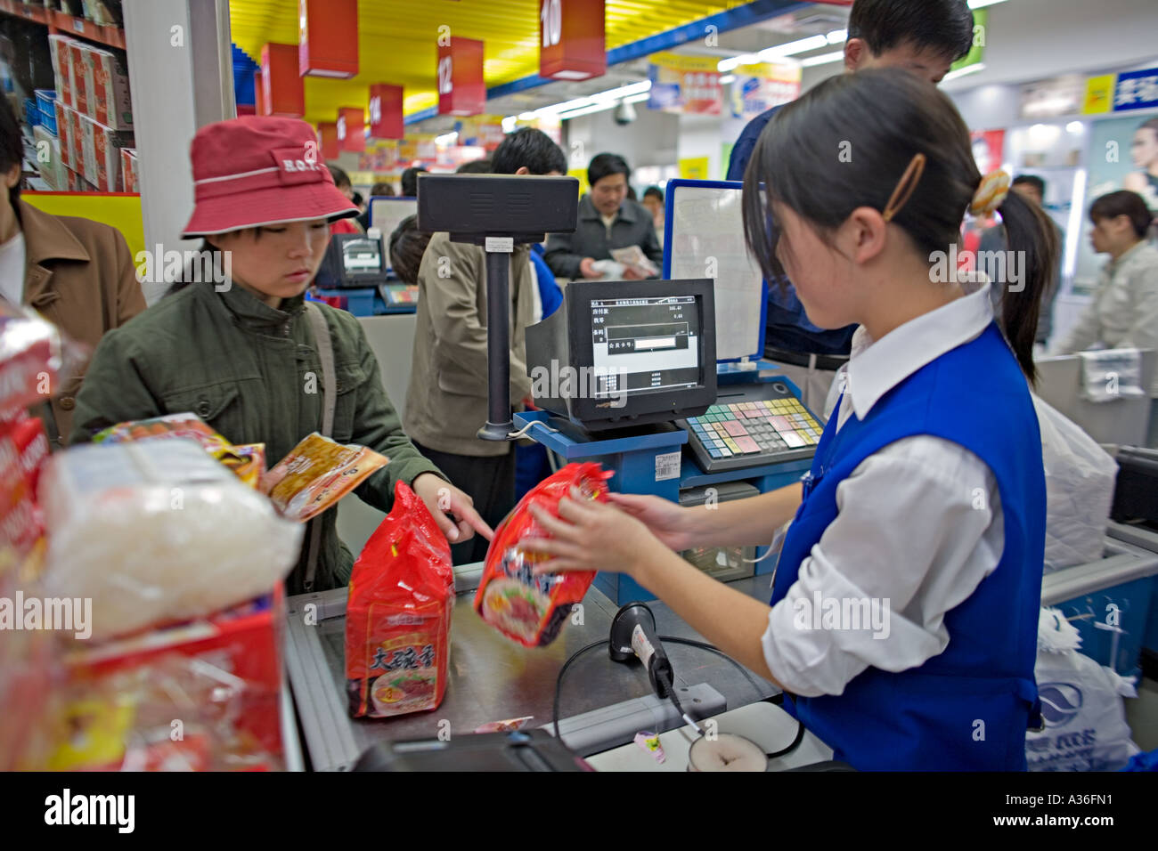 CHINA BEIJING Young Chinese woman buying prepared packaged food in ...