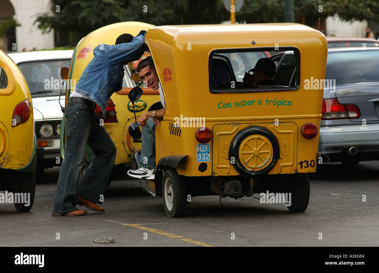 Man sitting in an auto rickshaw hi-res stock photography and images - Alamy
