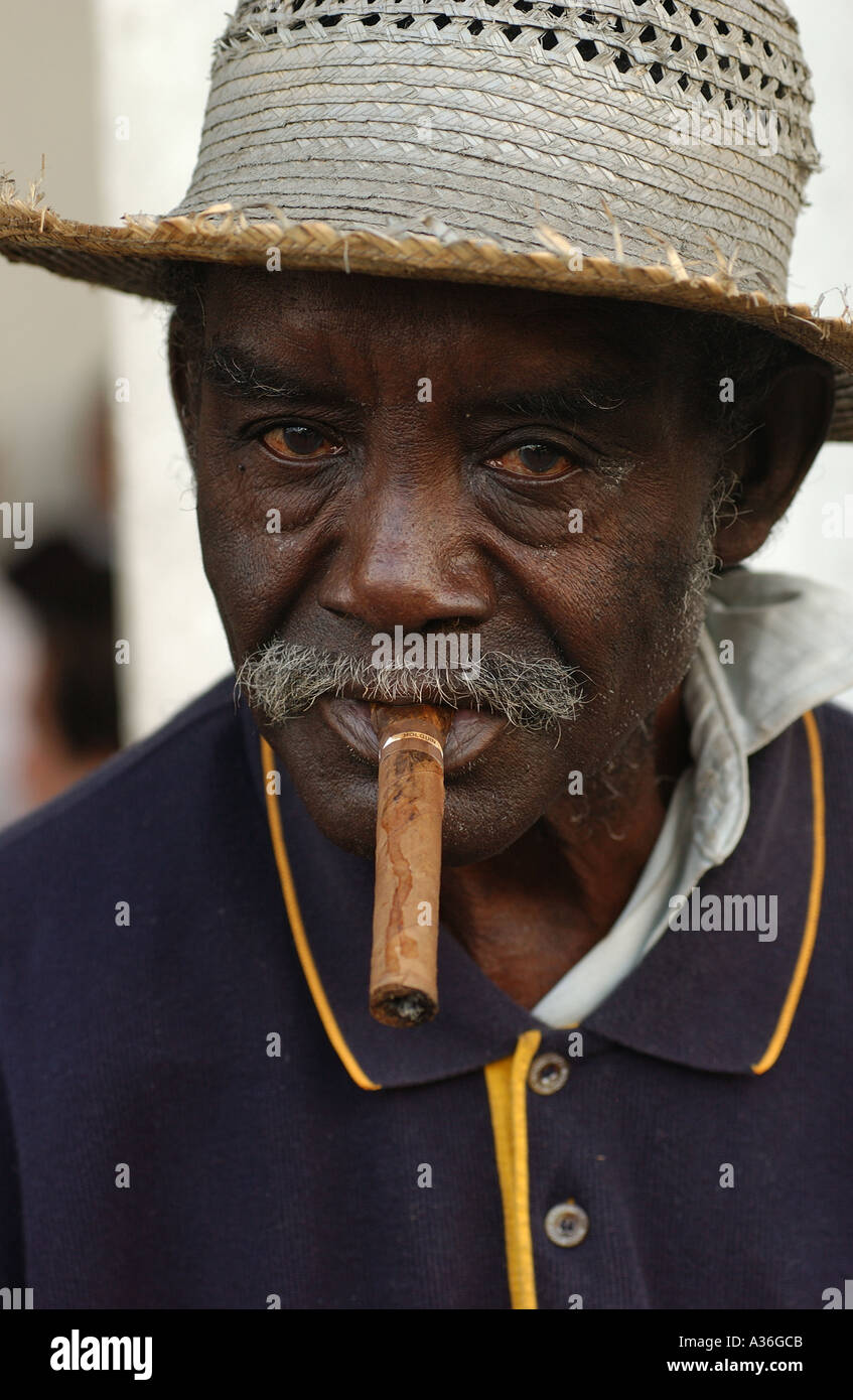 Man with a moustache and a straw hat hi-res stock photography and ...