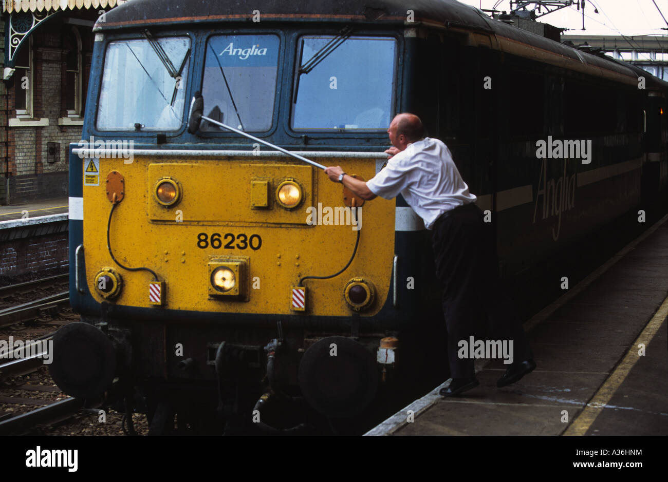 Windscreen of a passenger train being washed at Ipswich station ...