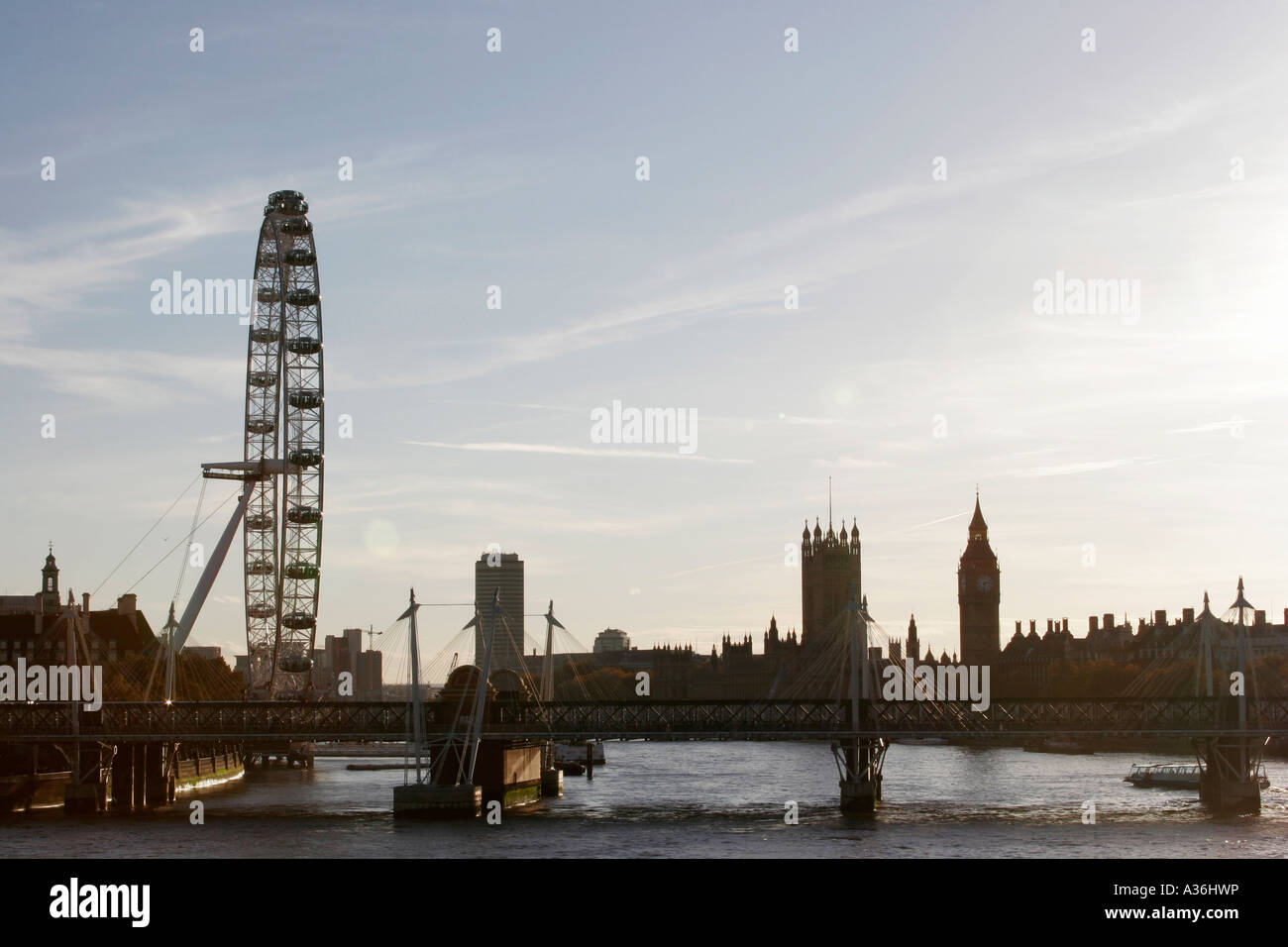 The view from Waterloo Bridge of The Wheel, Houses of Parliament and ...