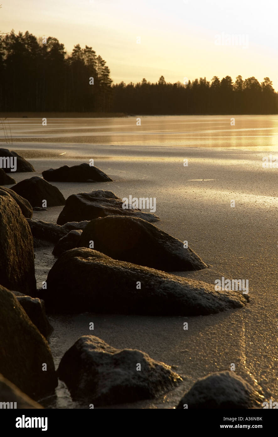 Frozen Lake in Finland at Sunset Stock Photo - Alamy