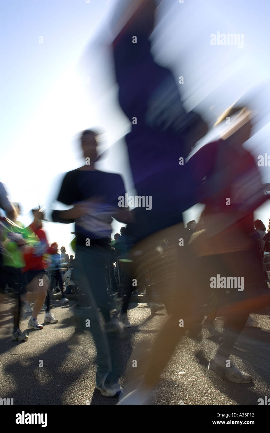 Speed blur image of group of runners Stock Photo - Alamy