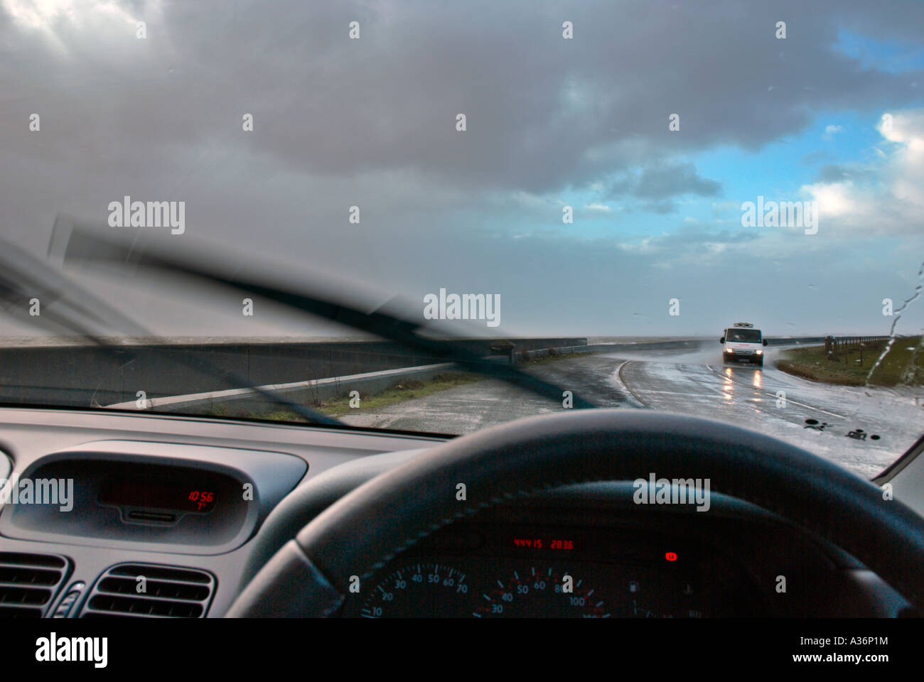 Stormy Day A rain swept and wind swept road viewed from inside a car ...