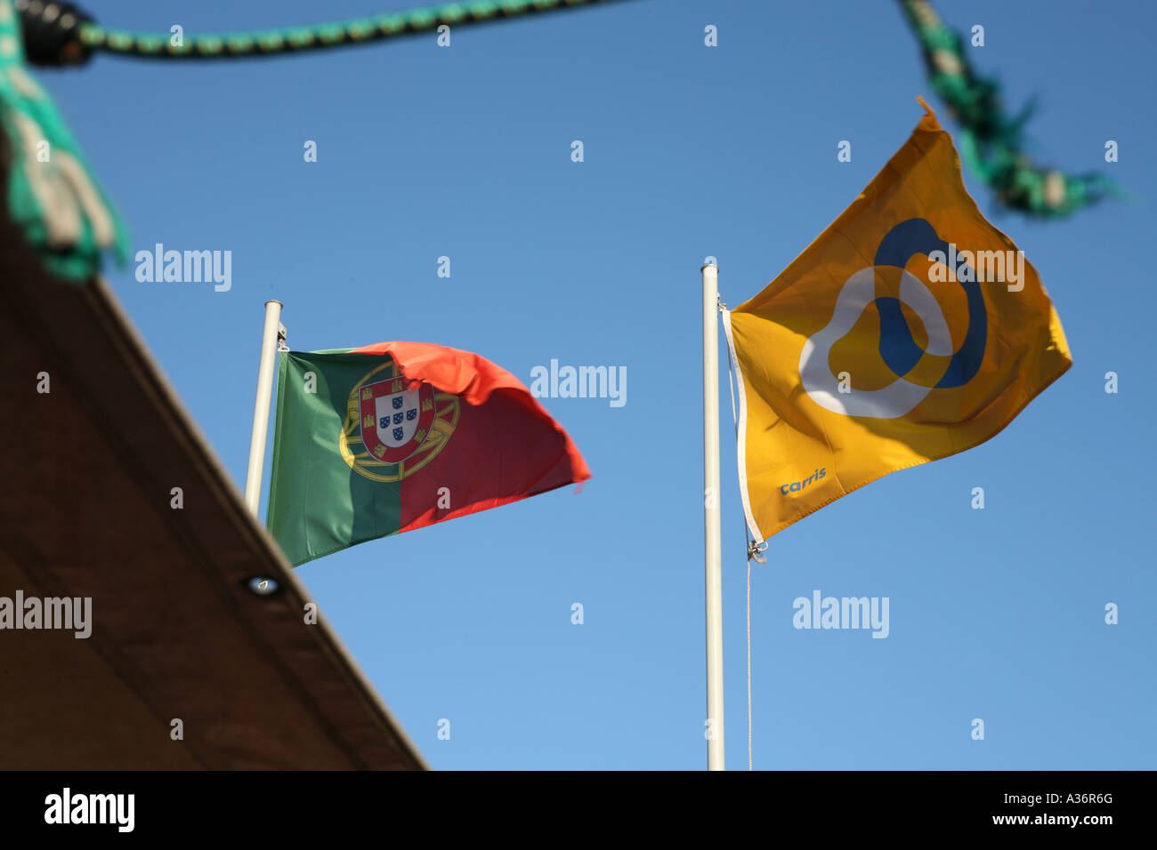 A portugues flag flies in the sky Stock Photo - Alamy