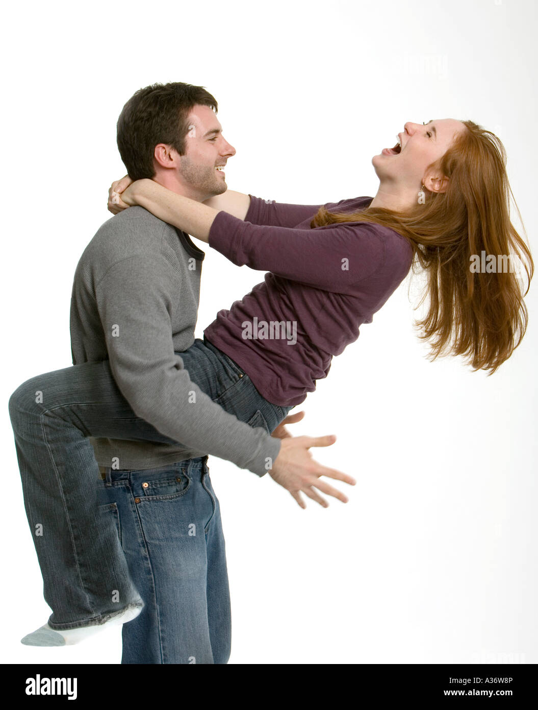 Young lovers laughing and roughhousing and generally having fun Stock ...