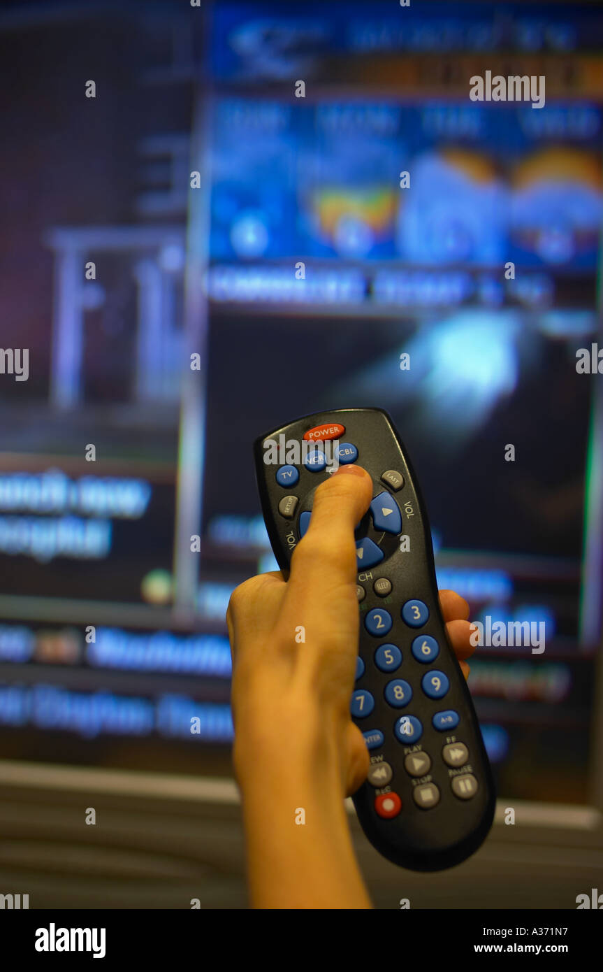 Remote control hand commercial hi-res stock photography and images - Alamy