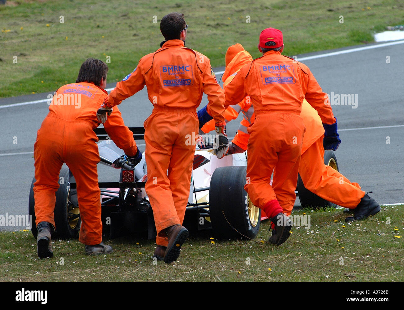 Marshalls working at Oulton Park Stock Photo - Alamy