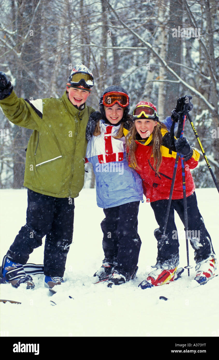 Three happy ski girls on the slopes on Sunday River ski resort Stock ...