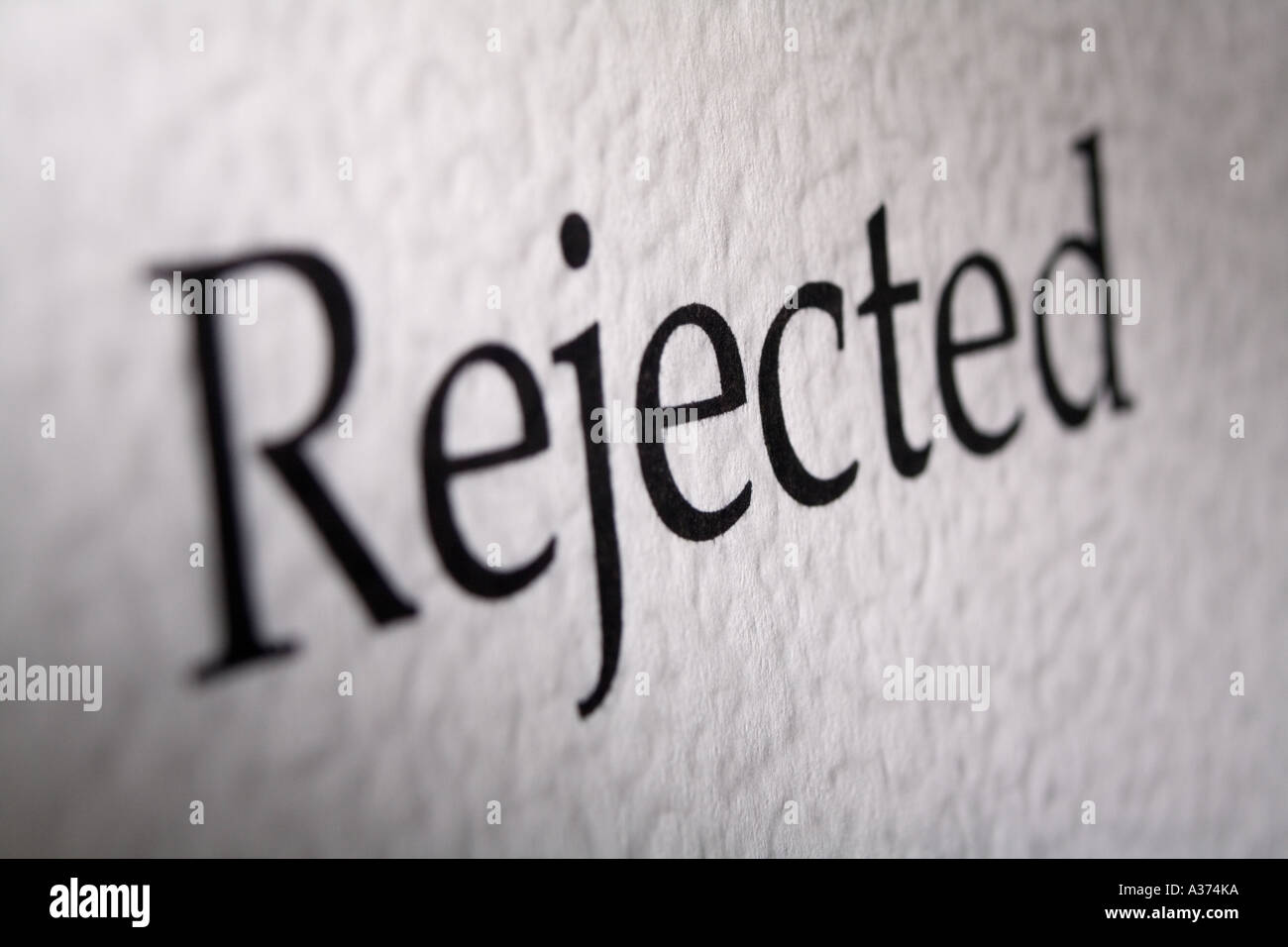 the word rejected printed on to texture paper Stock Photo - Alamy