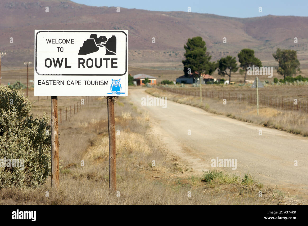 'Welcome to Owl Route' sign along the Karoo road leading to Nieu ...