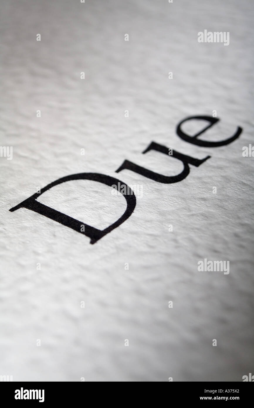 the word due printed on to texture paper Stock Photo - Alamy