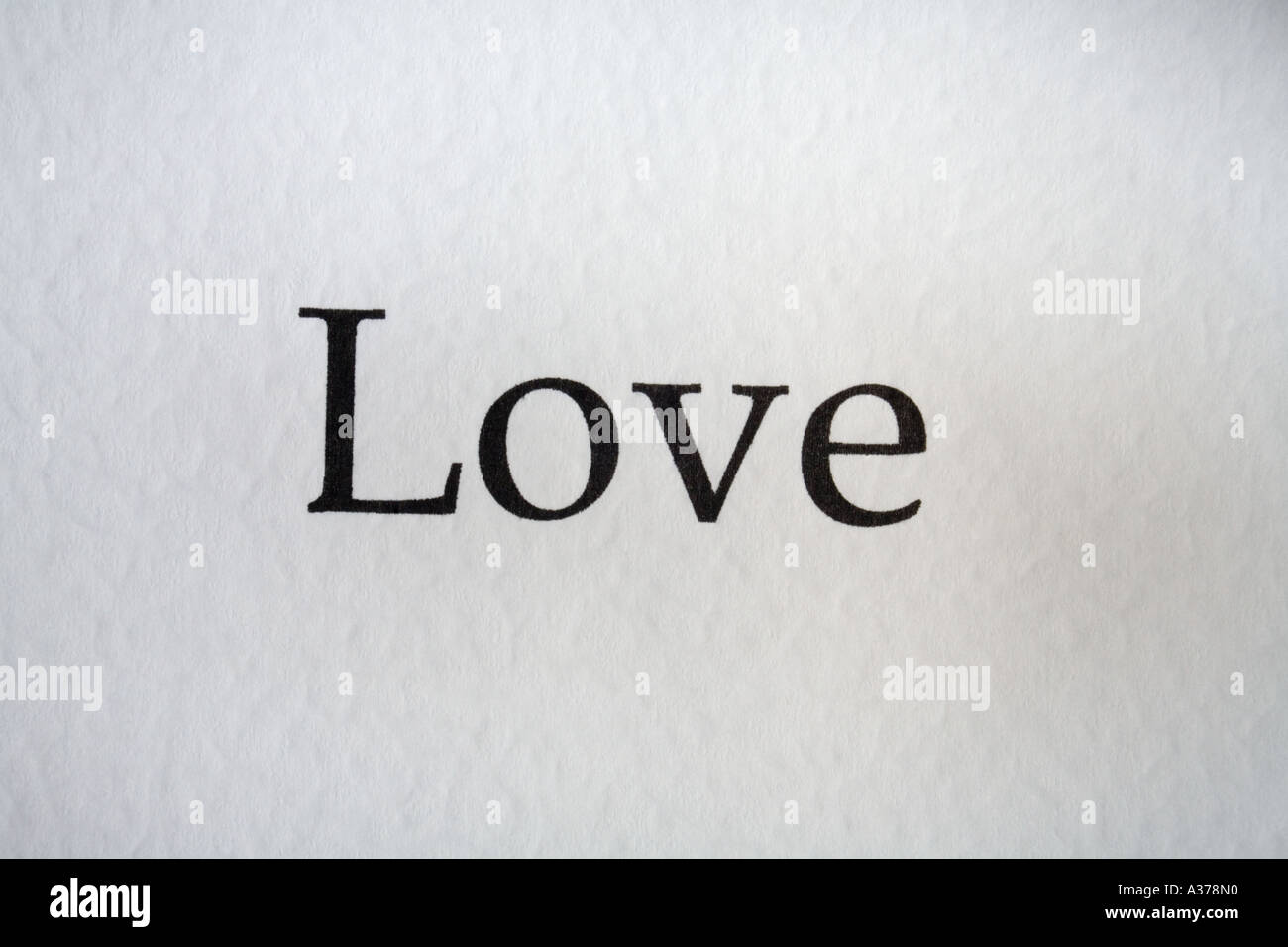 the word love printed on to texture paper Stock Photo - Alamy