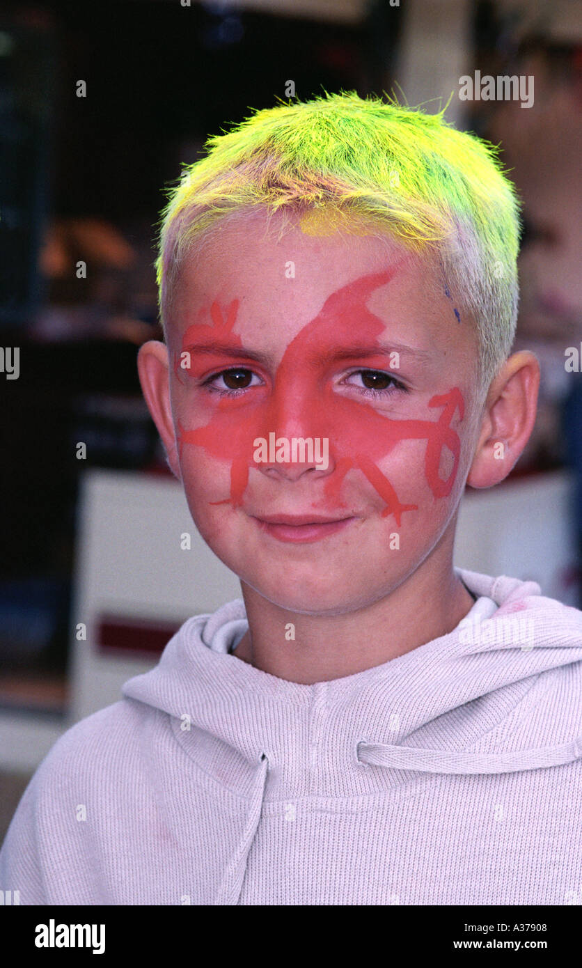 Welsh boy youngster with the national symbol red dragon painted on his ...