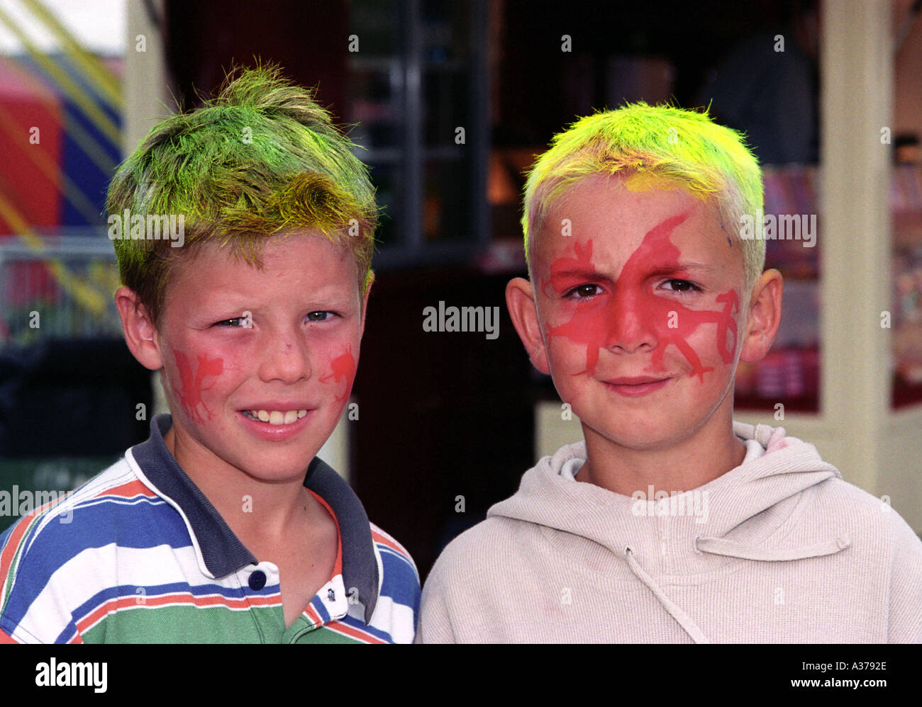 Welsh boys with the national symbol red dragon painted on his face ...