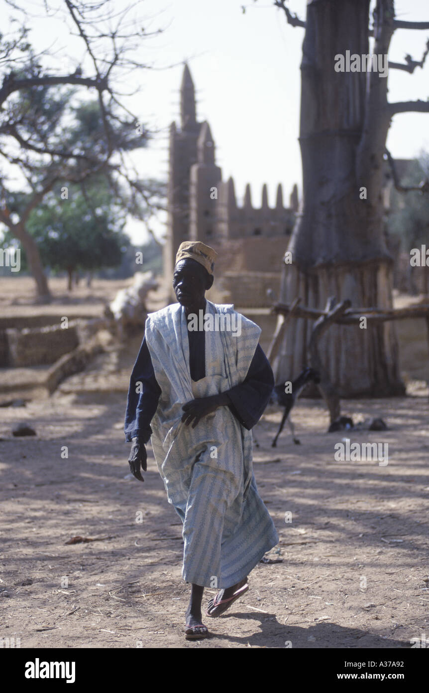 Inside a Dogon village A mud built mosque in the distance Dogon region ...