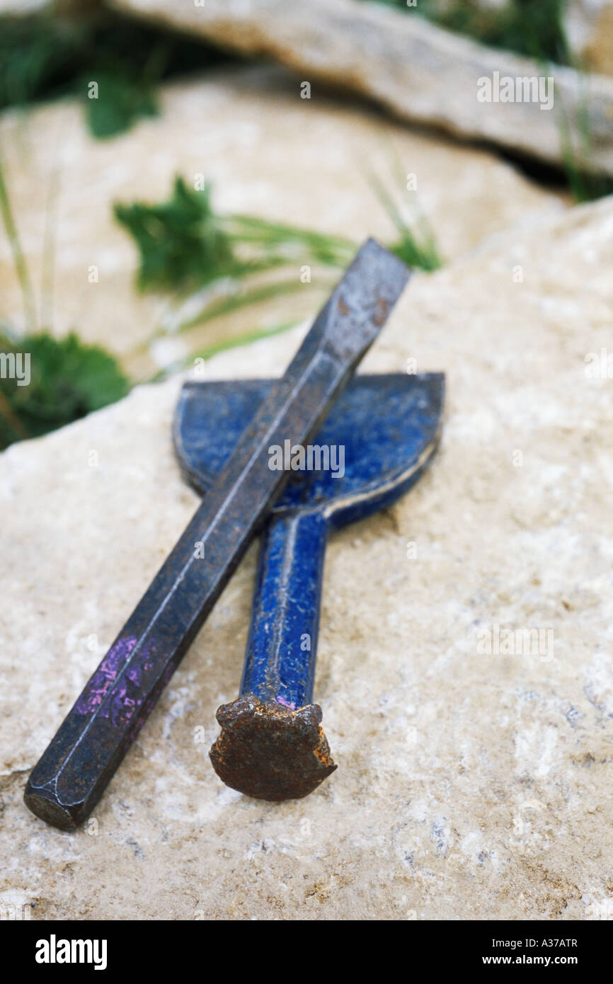 Masonary tools on stone work surface Stock Photo - Alamy