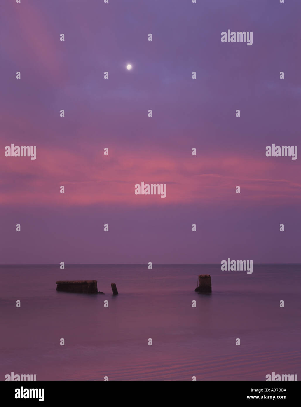 moonset over water Stock Photo - Alamy