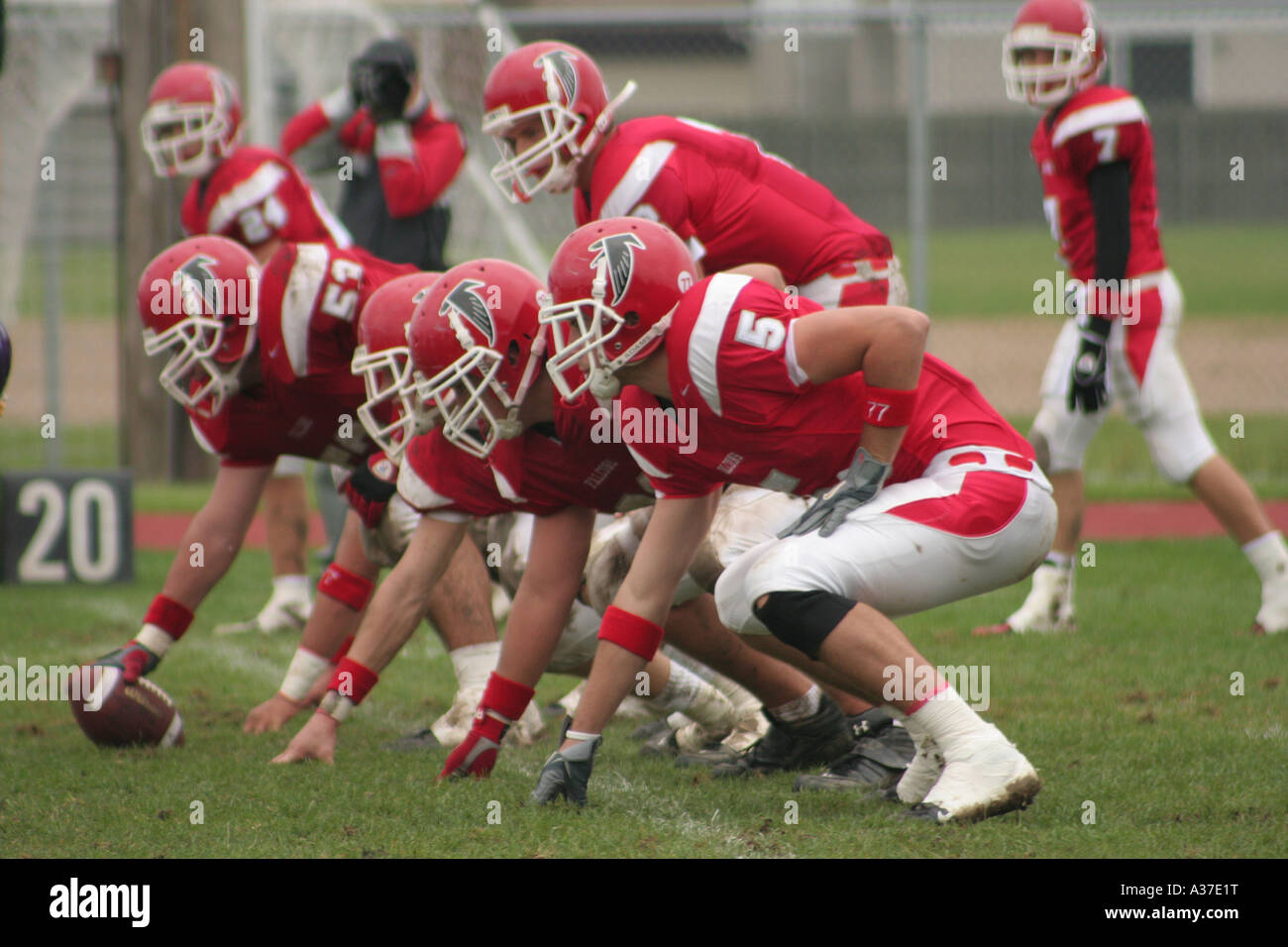 Football players on the line, prior to the snap Stock Photo - Alamy