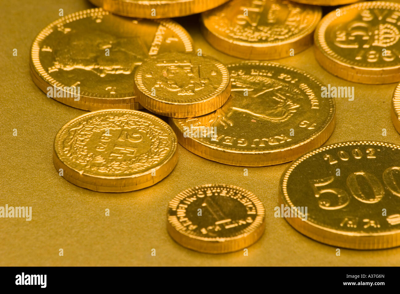 Gold Chocolate coins Stock Photo - Alamy