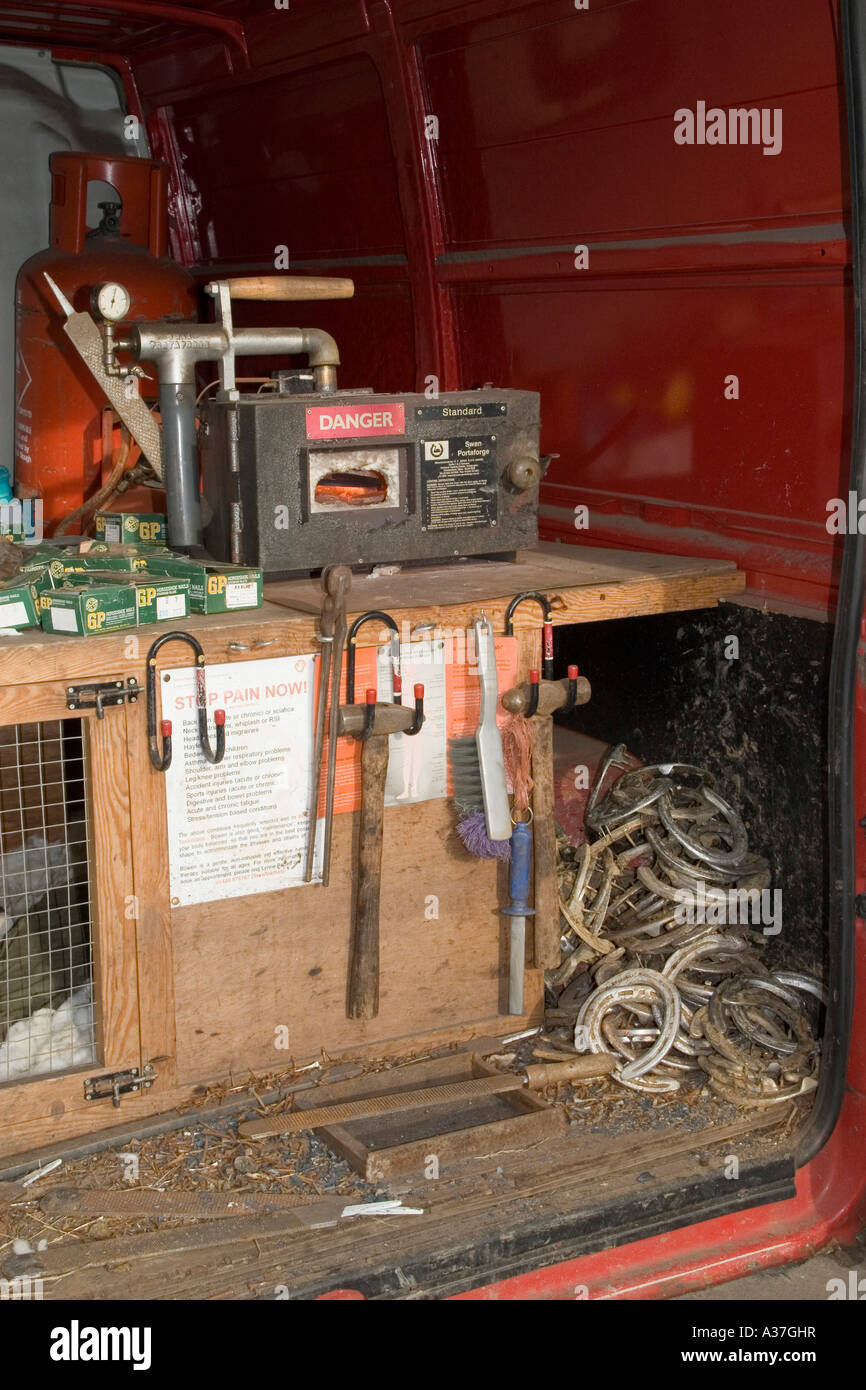 mobile farriers van with old horses shoes forge and other equipment ...