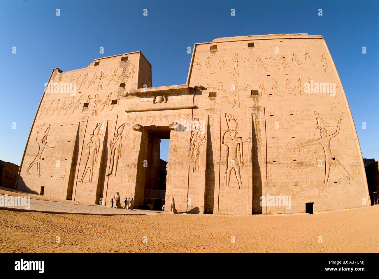 The Pylons and main entrance to the Temple of Edfu large wall carvings ...