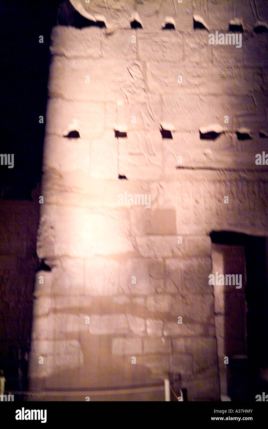 Karnak Temple wall lit Sound and Light Spectacle evening visitors walk ...