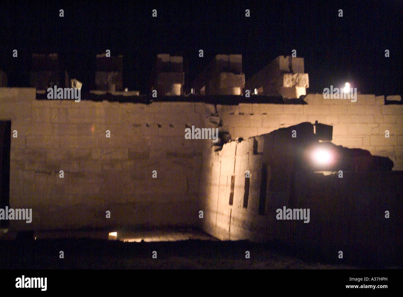 Karnak Temple wall lit Sound and Light Spectacle evening visitors walk ...