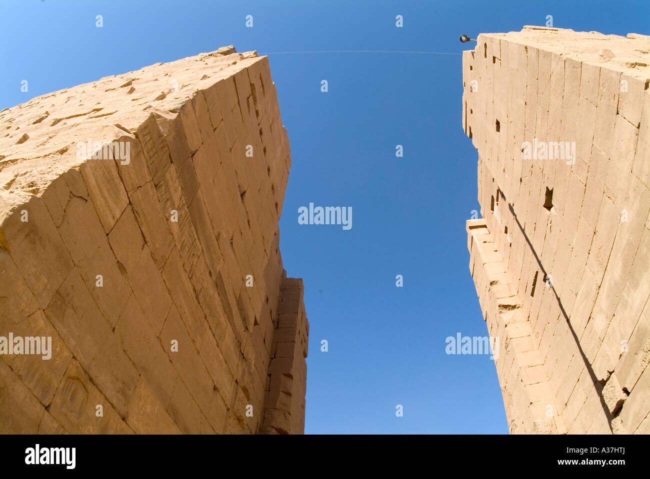 Karnak Temple upward view of entrance through first pylon Sanctuary of ...