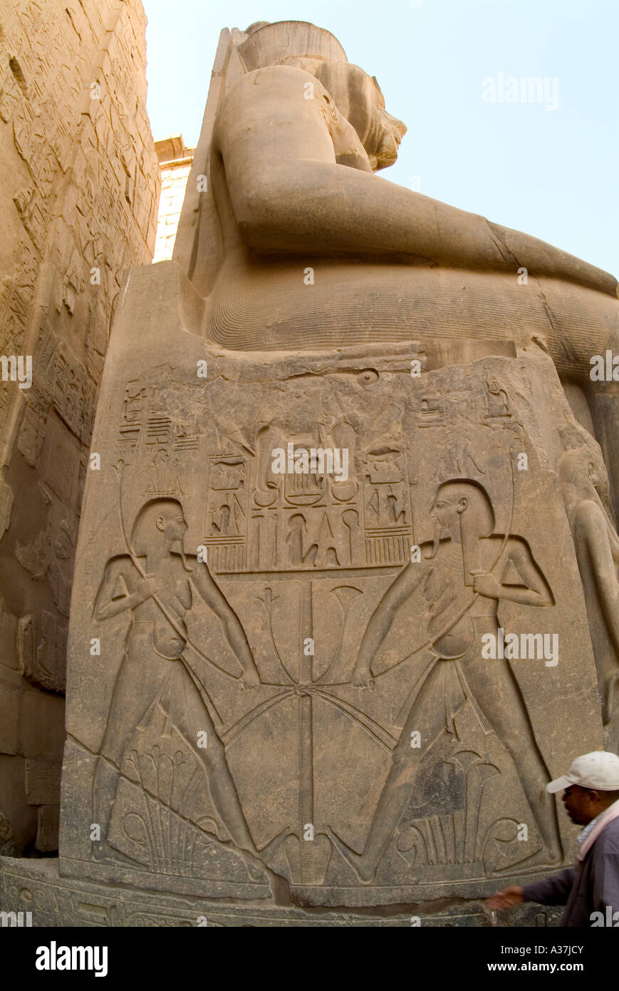 Luxor Temple Thebes hieroglyphics figures colossal statue pharaoh side ...