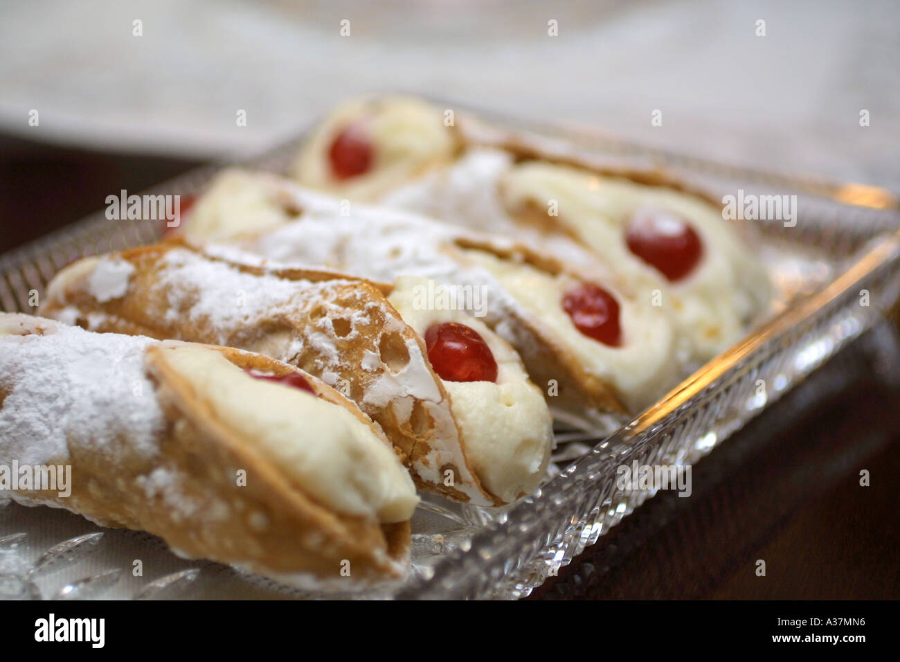 Dessert cannoli with cream and cherries Stock Photo - Alamy