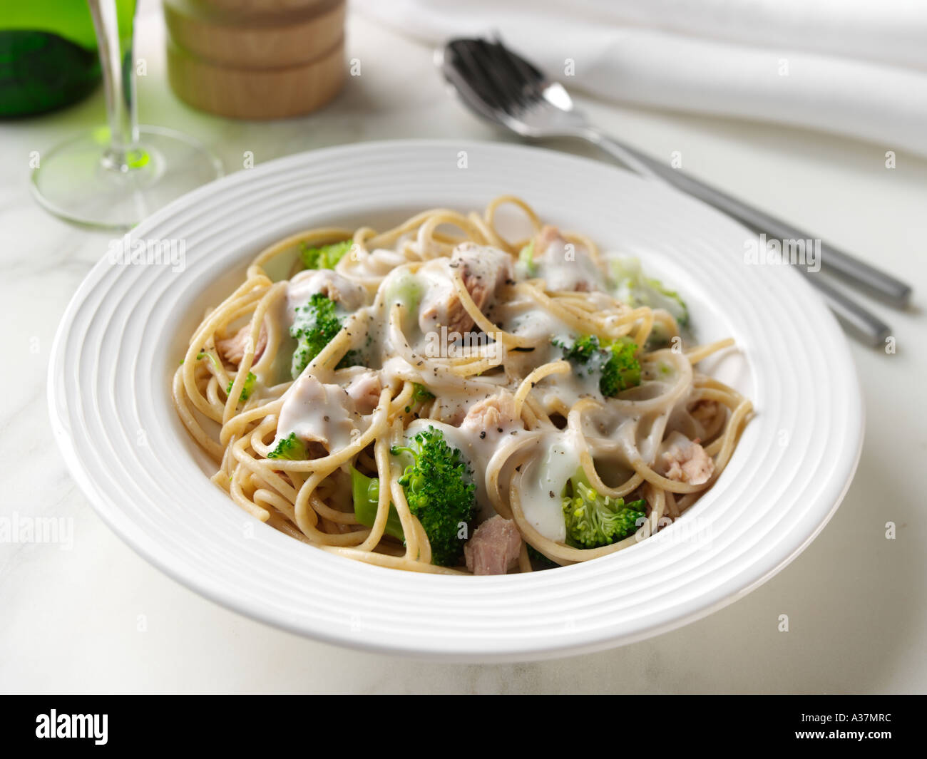 Wholewheat spaghetti with bechamel sauce and tuna Stock Photo - Alamy