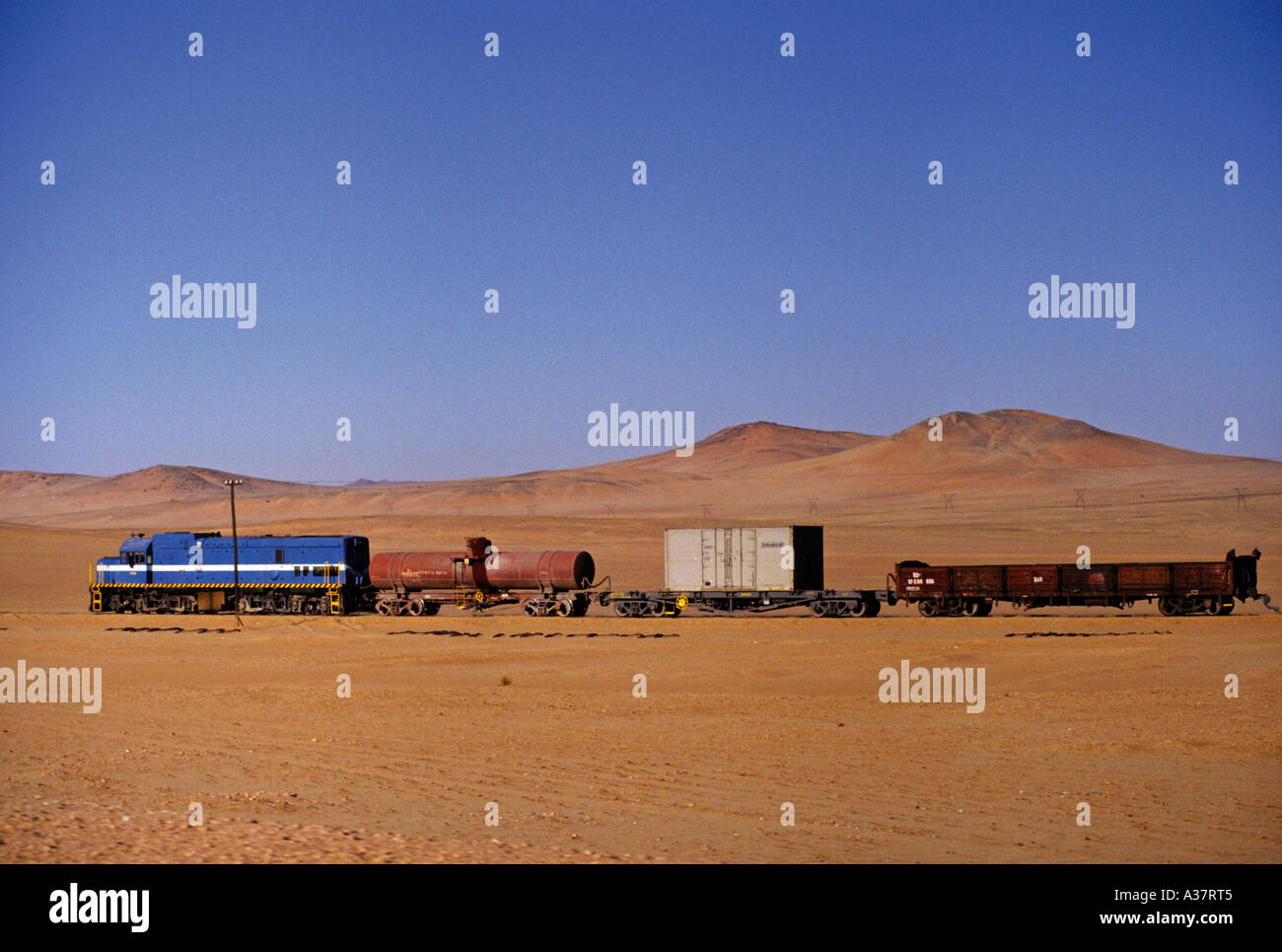 Goods railway train crossing Namib desert near Luderitz Namibia Africa ...