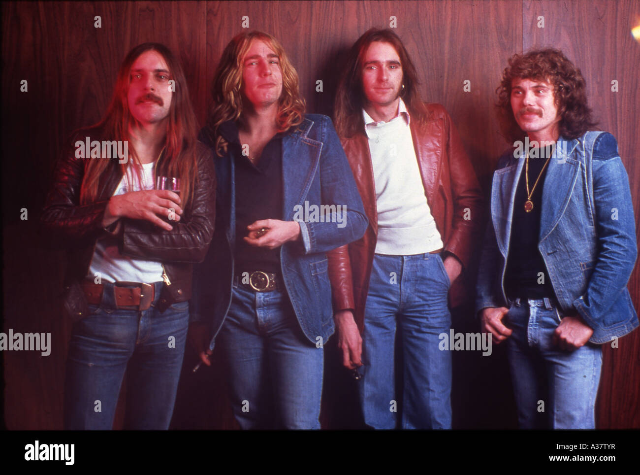 STATUS QUO UK group about 1976 from l: John Coughlan, Rick Parfitt ...
