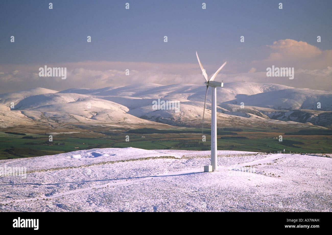 A winter snow covered scenic landscape with wind turbine part of Hare ...