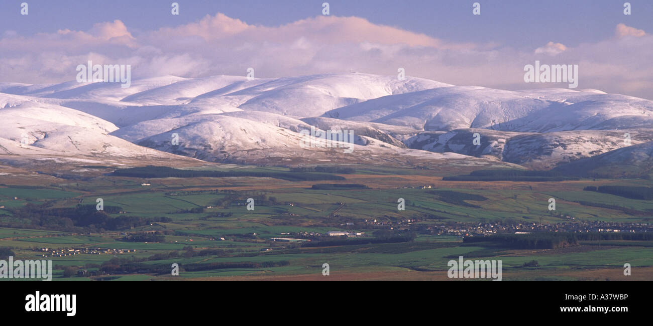 Winter landscape Sanquhar with snow topped Lowther Hills behind Upper ...