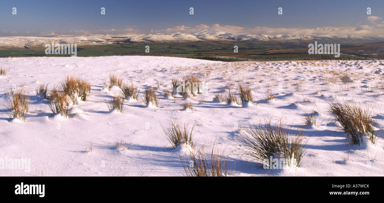 Panoramic winter landscape snow on side of Hare Hill looking across ...