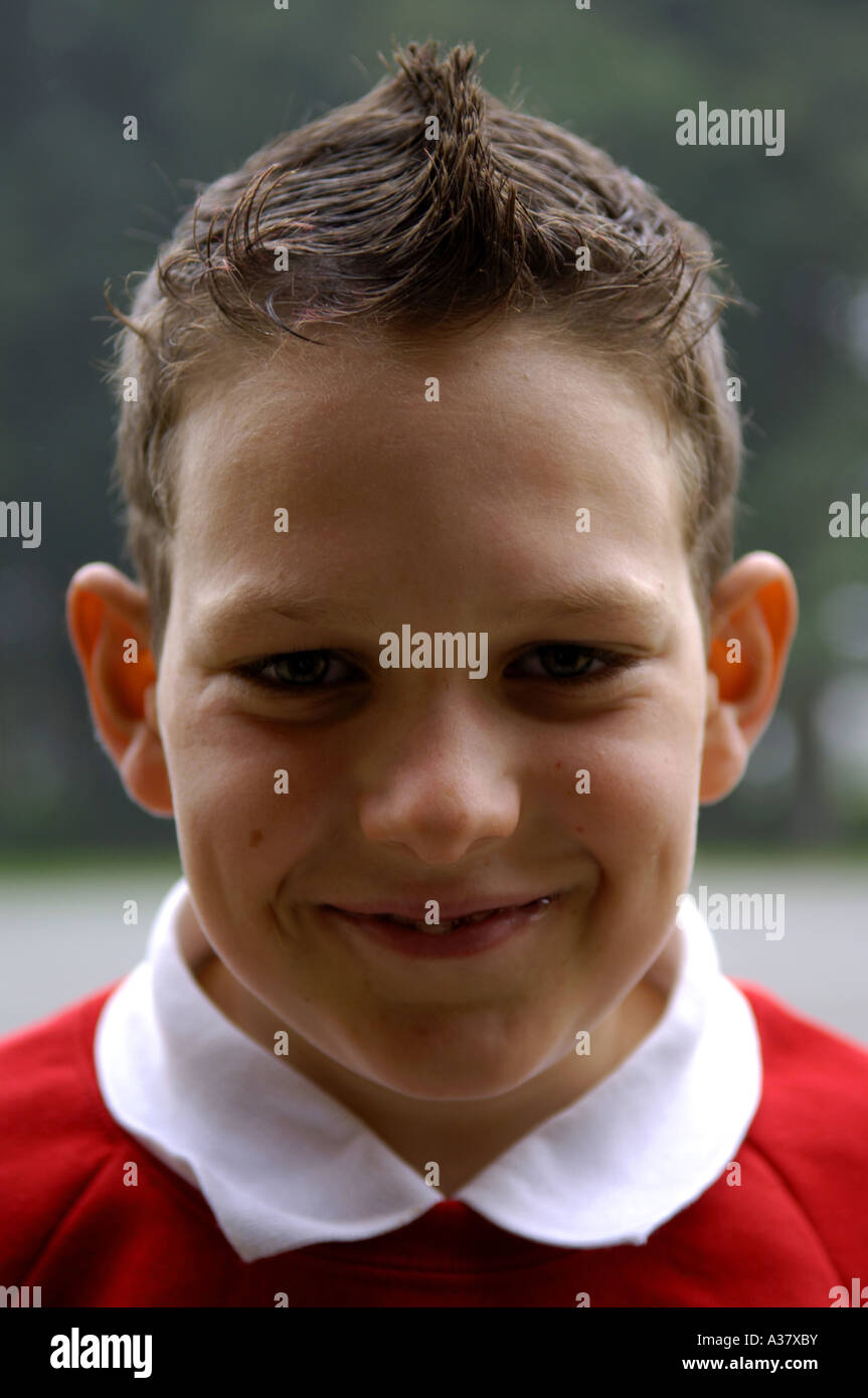 eleven youth young youngster face head headshot portrait red kid boy ...