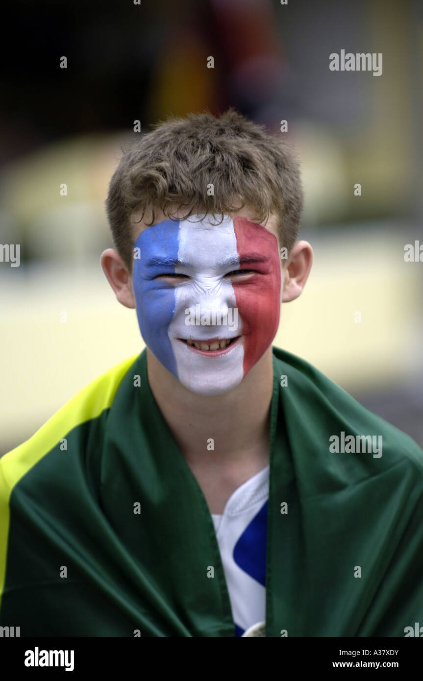 Boy painted face sport supporter hi-res stock photography and images ...