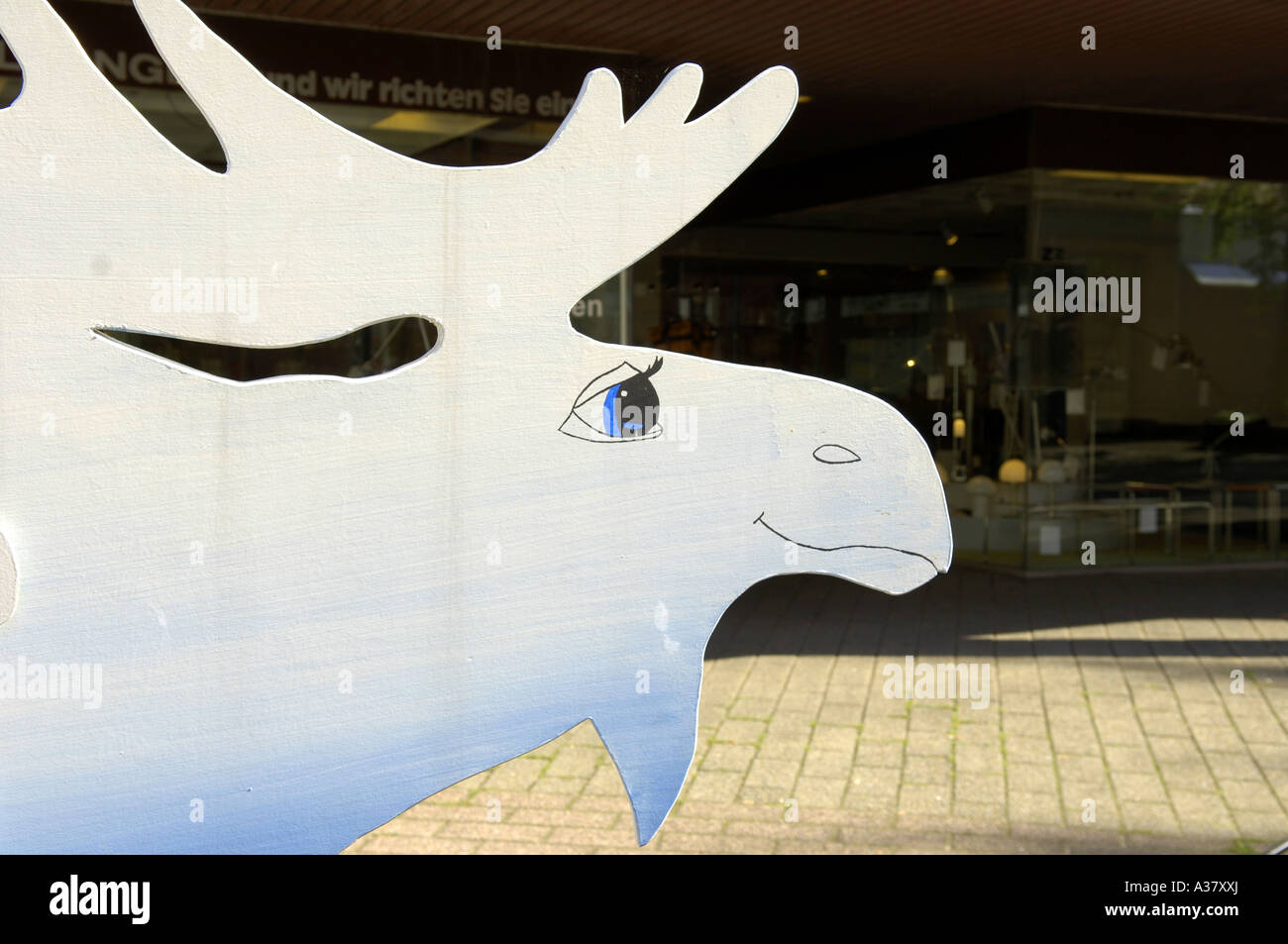 blue wooden reindeer finland finnish lapland comic wood Stock Photo - Alamy
