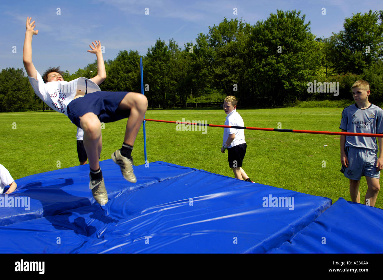 sports day male lad boy kid child high jump athletics pe physical ...