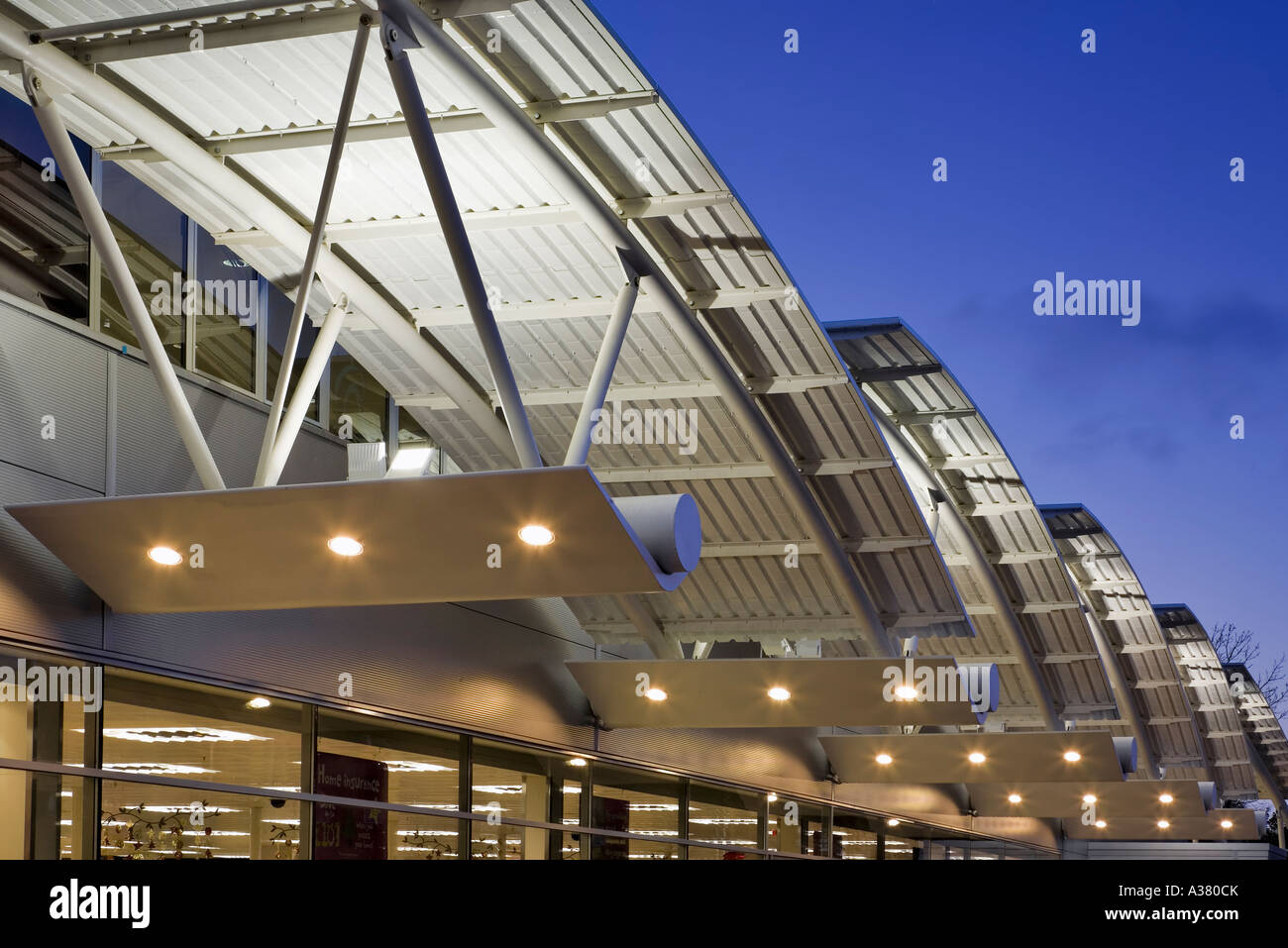 Architectural Detail. Supermarket canopy at dusk showing lighting Stock ...
