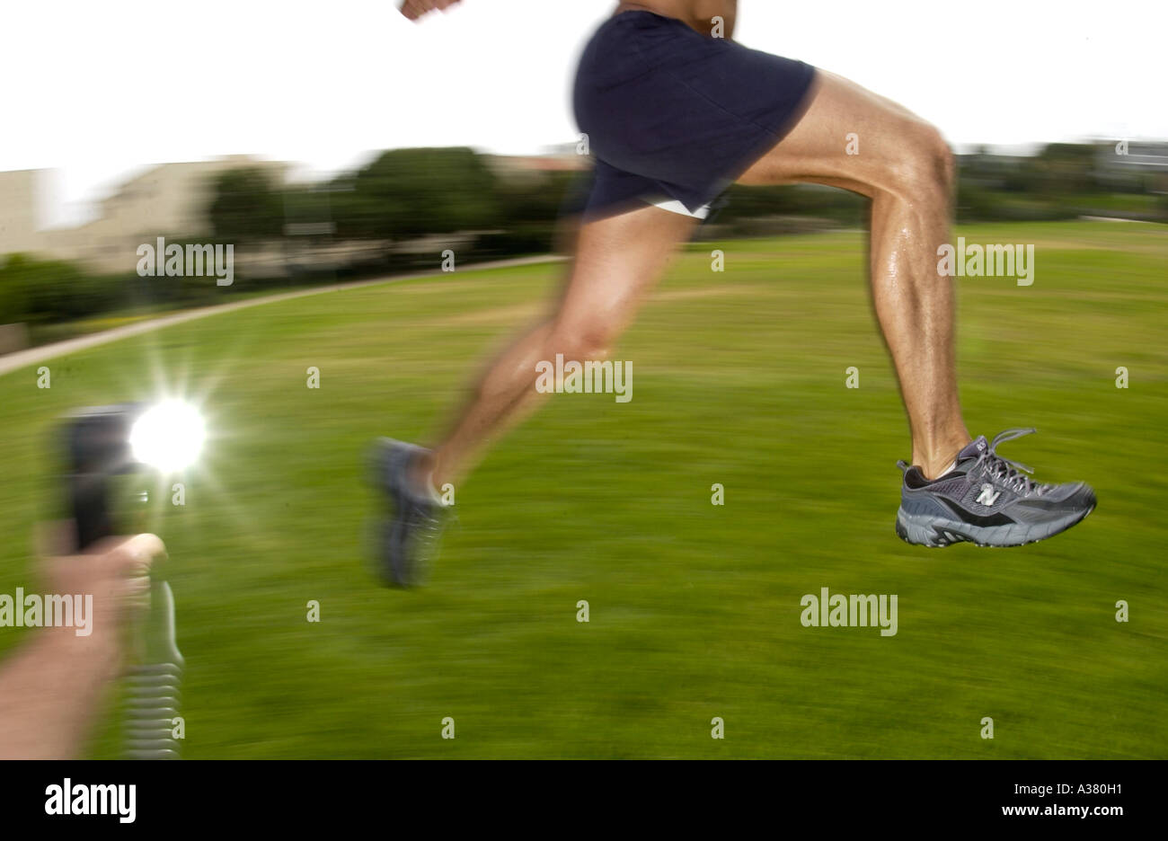 A man running in a park for exercise Stock Photo - Alamy