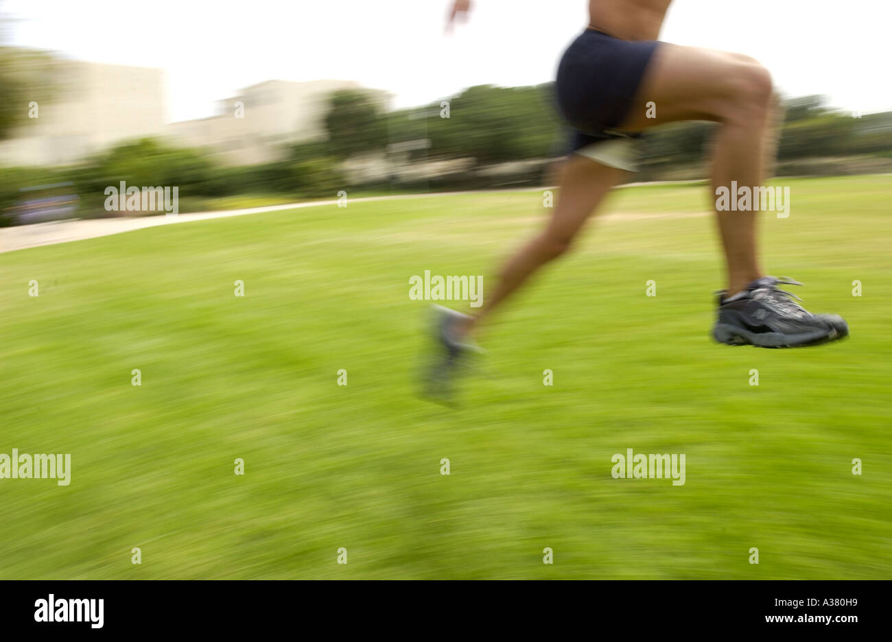 A man running in a park for exercise Stock Photo - Alamy