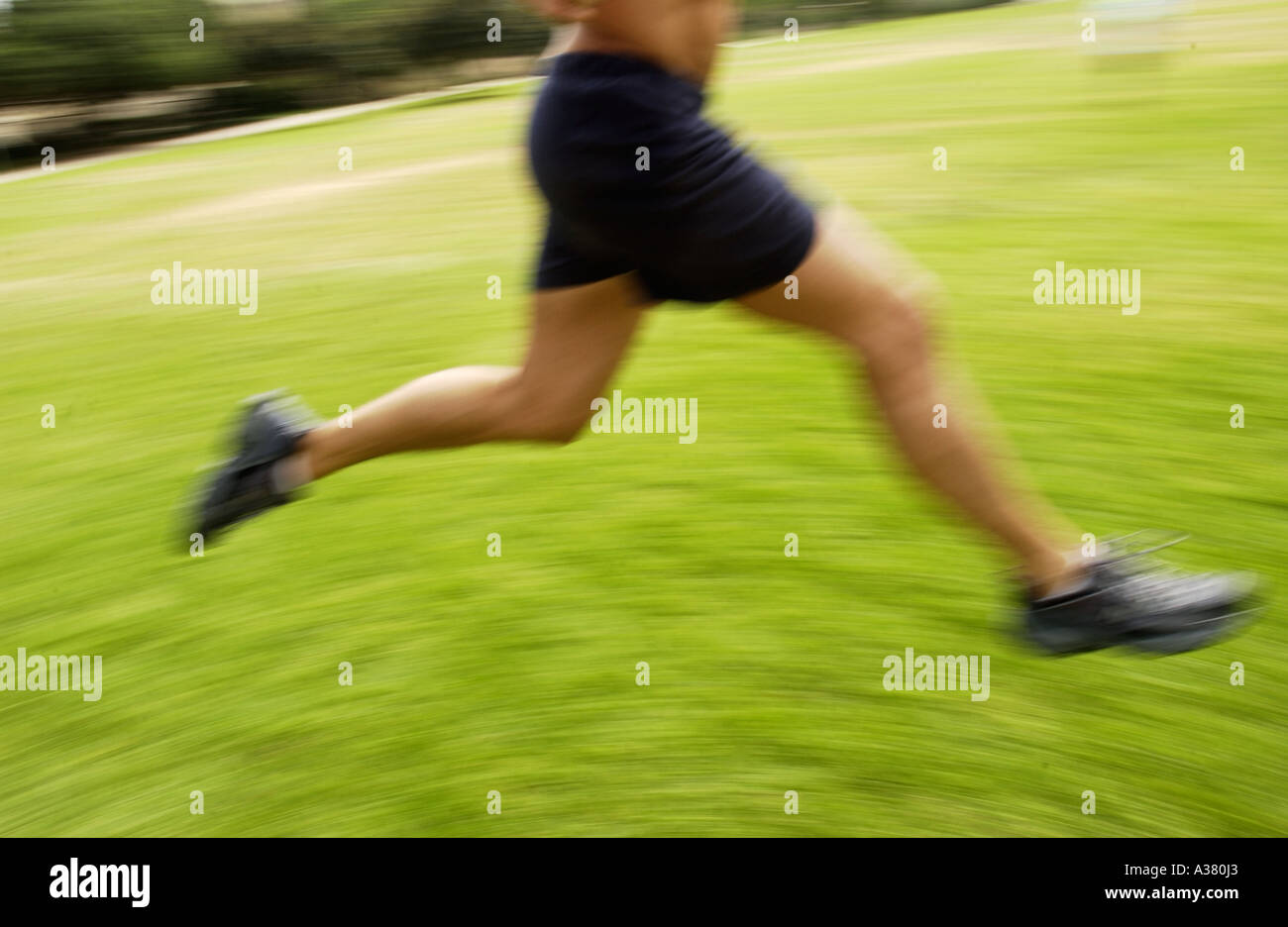 A man running in a park for exercise Stock Photo - Alamy