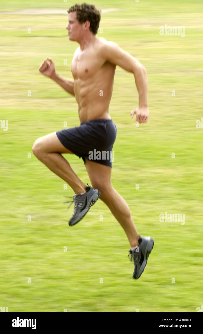 A man running in a park for exercise Stock Photo - Alamy