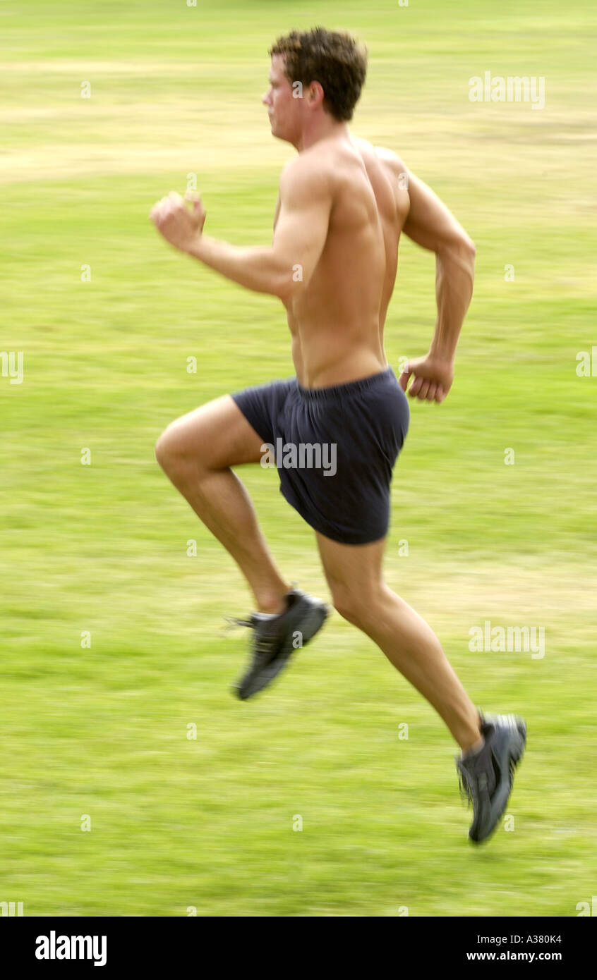 A man running in a park for exercise Stock Photo - Alamy