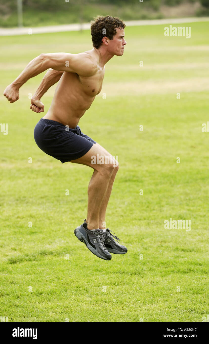 A man running in a park for exercise Stock Photo - Alamy
