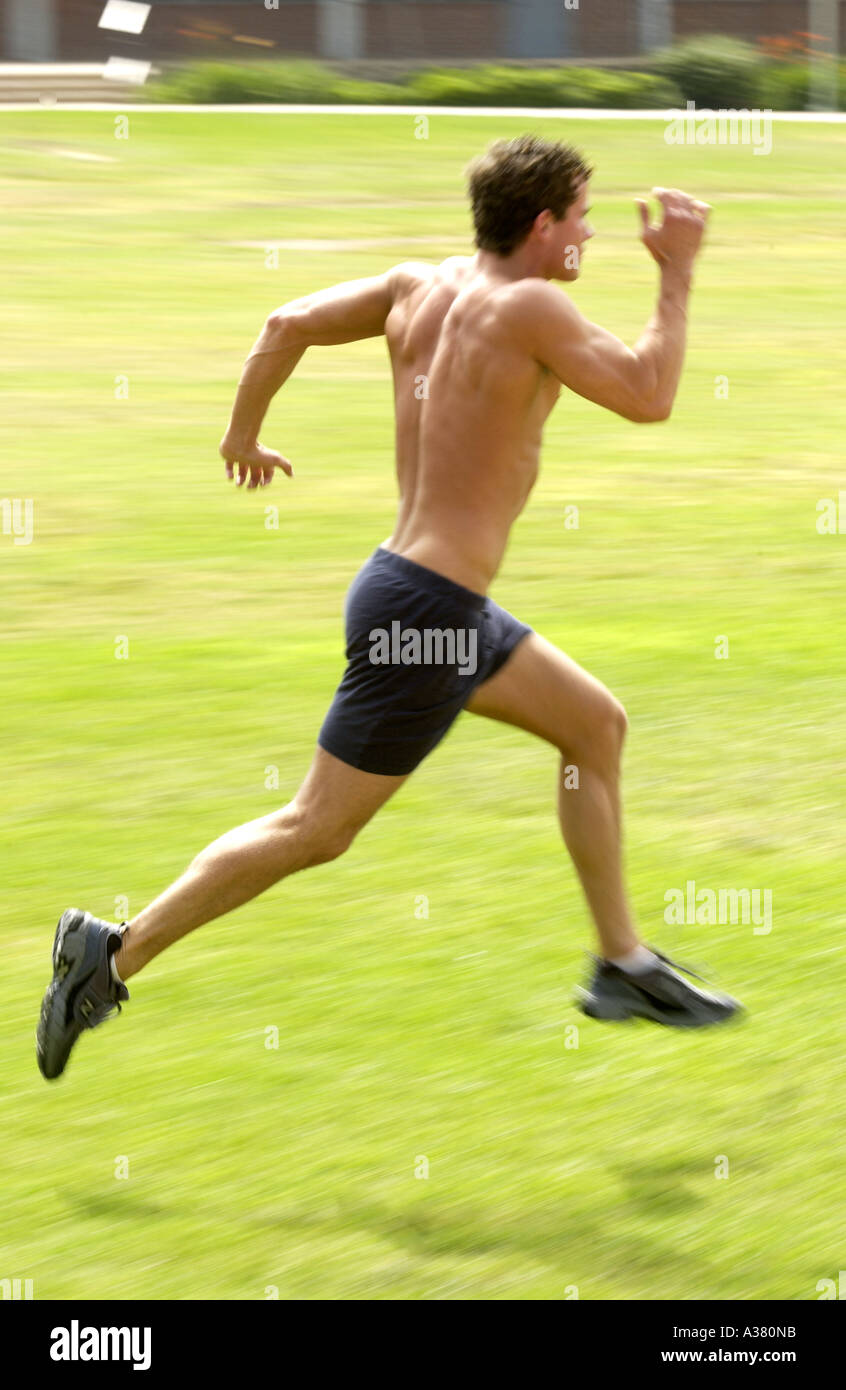 A man running in a park for exercise Stock Photo - Alamy