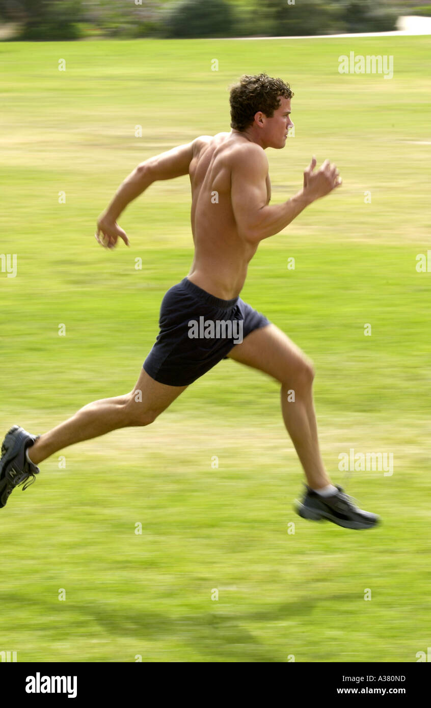 A man running in a park for exercise Stock Photo - Alamy